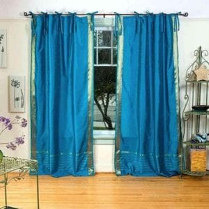 Hermosos ambientes con el uso de cortinas azul turquesa